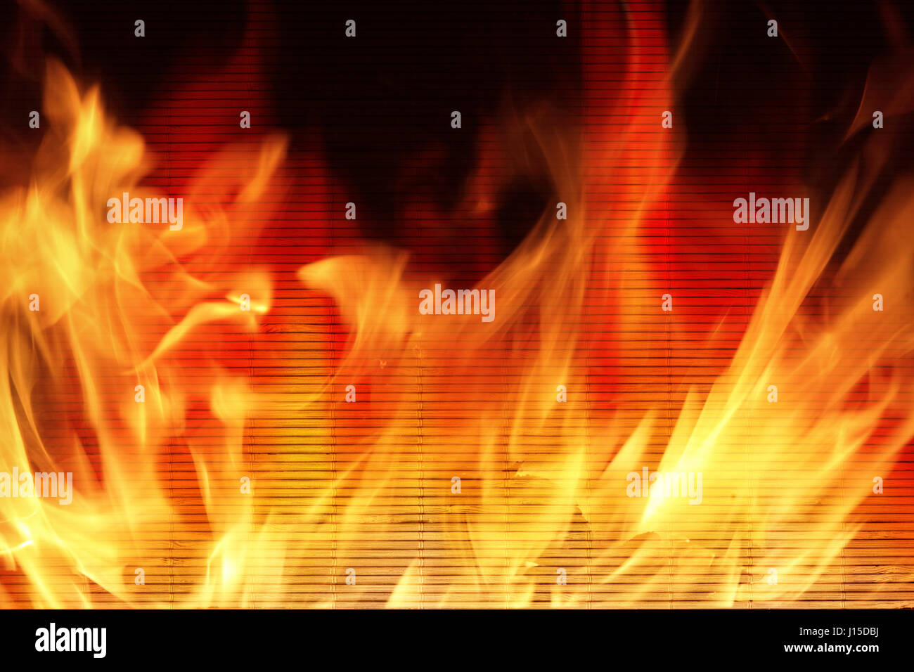 Wooden wall on fire with flames - Fire safety concept Stock Photo - Alamy