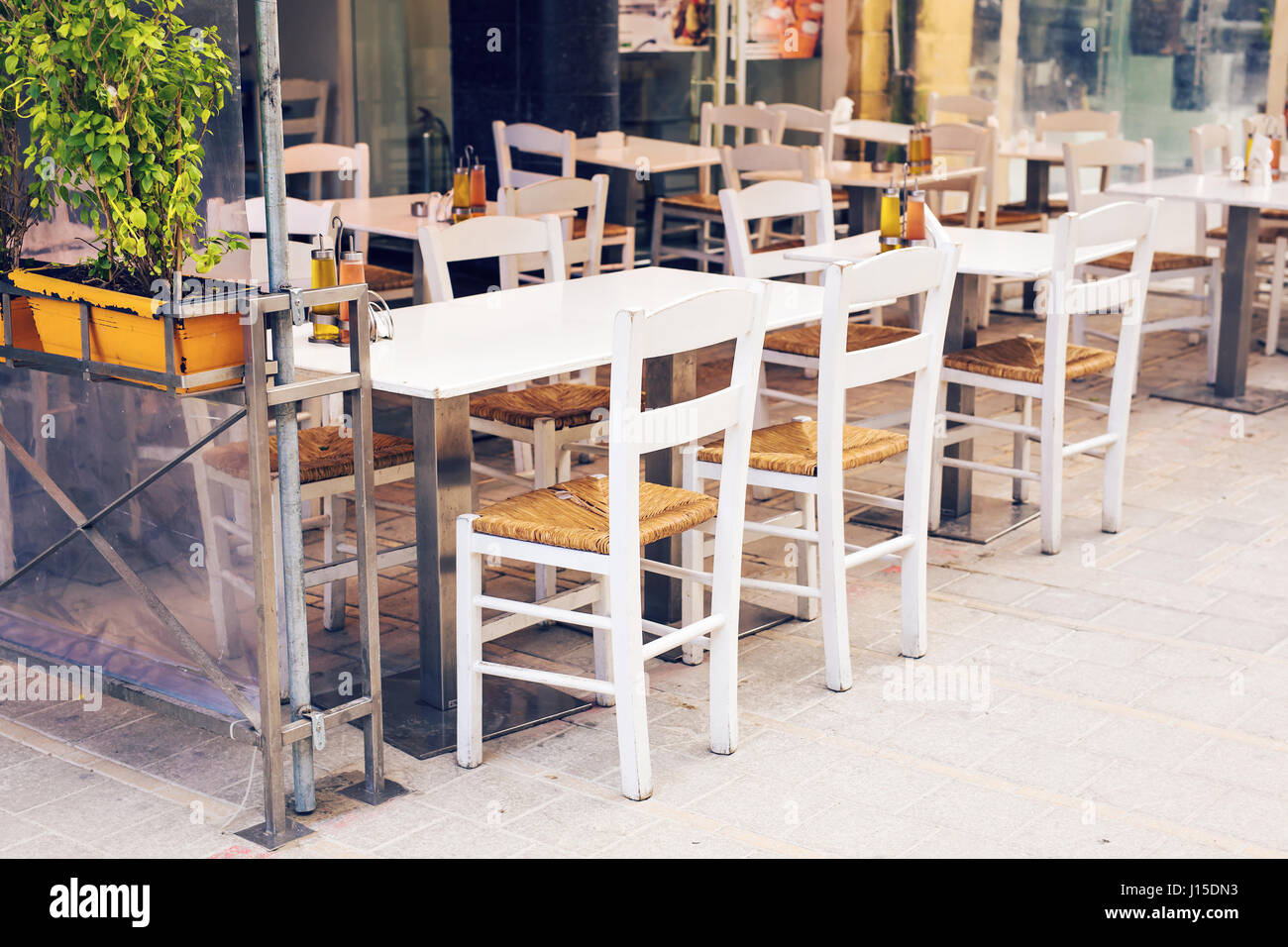 Street cafe. Cozy outdoor restaurant Stock Photo - Alamy