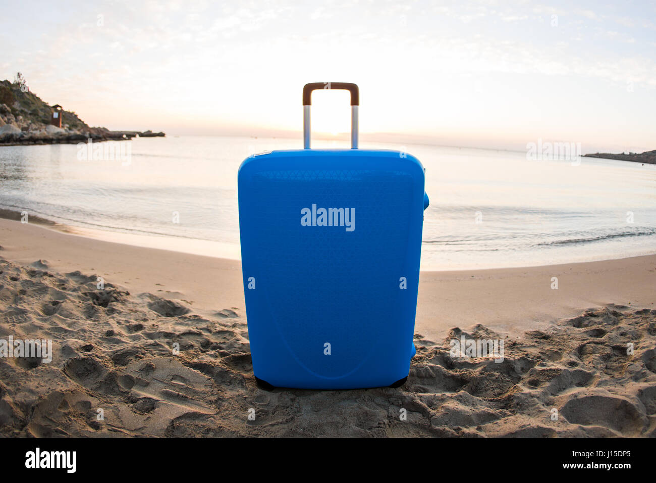 Travel, holiday and vacation concept - blue suitcase on the beach Stock ...