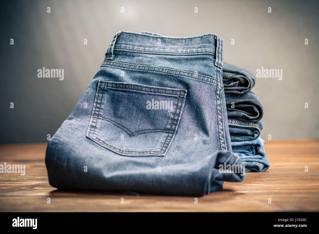 Pile of jeans Stock Photo - Alamy
