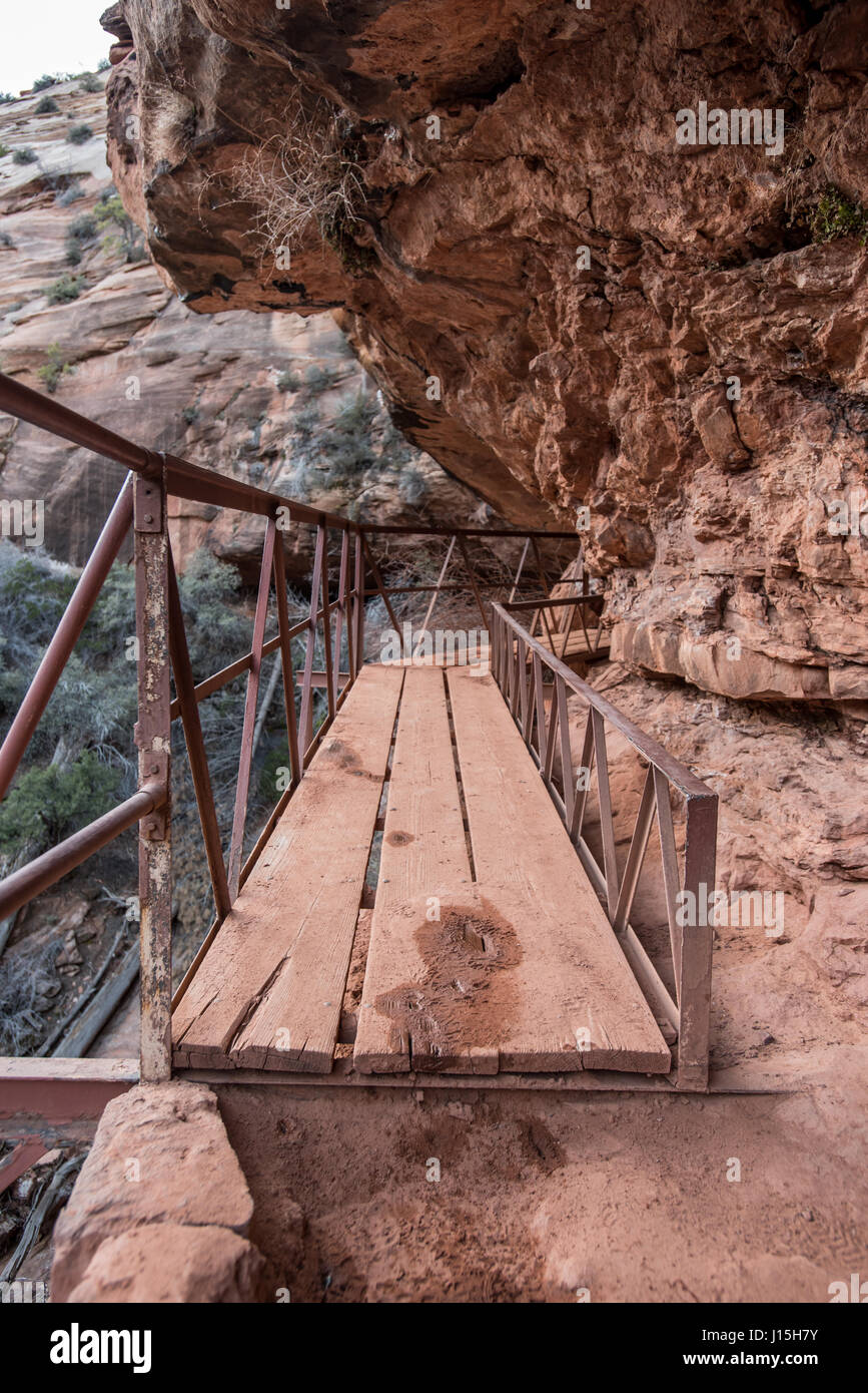 Precarious Plank Bridge On Cliff Connects Trails Stock Photo - Alamy
