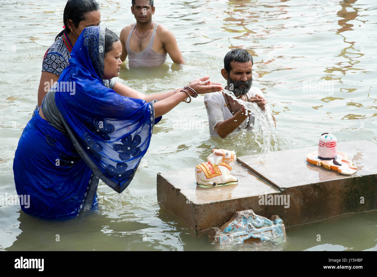 Woman Praying By The Water