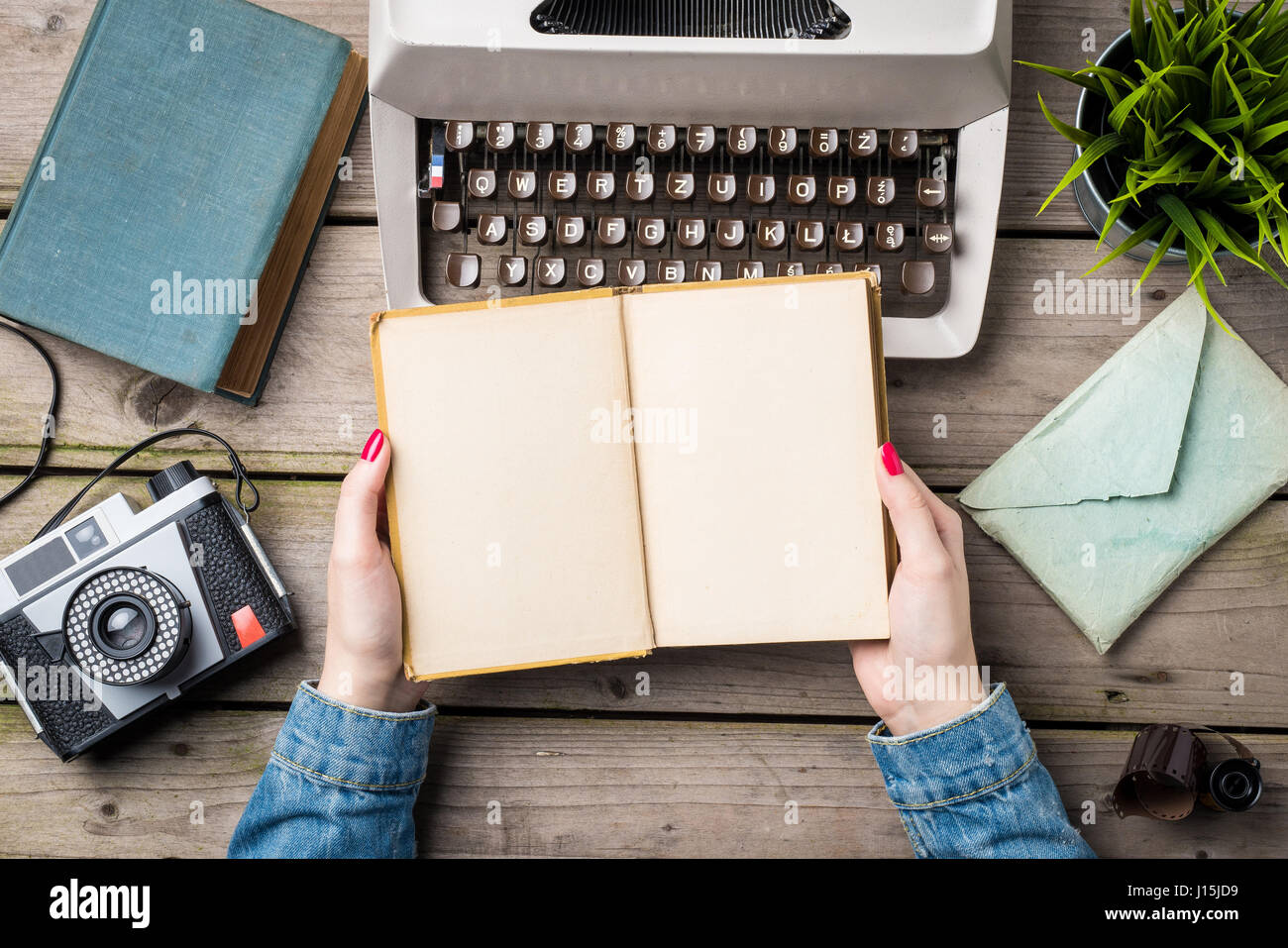 Woman holding old notebook copyspace hi-res stock photography and ...