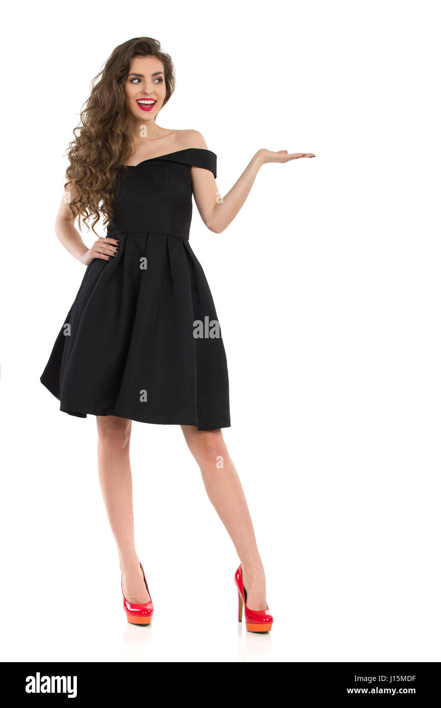 Woman standing legs apart high heels hi-res stock photography and ...