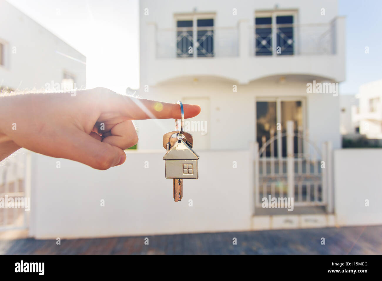 key in hand for new home and real estate Stock Photo - Alamy