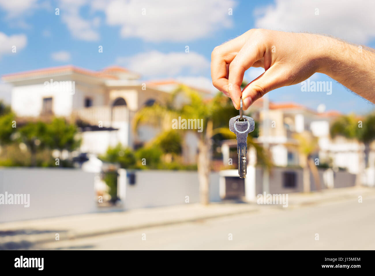 key in hand for new home and real estate Stock Photo - Alamy