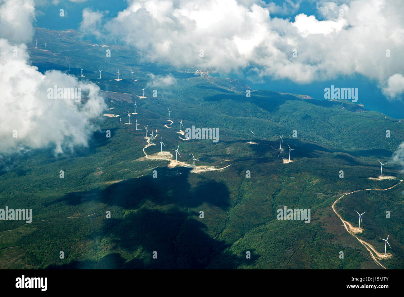 Panorama skyline view of cloudy blue sky from airplane window over wind ...