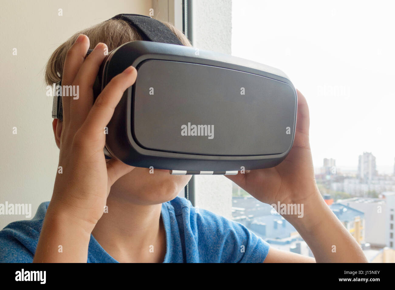 Child using new VR glasses Stock Photo - Alamy
