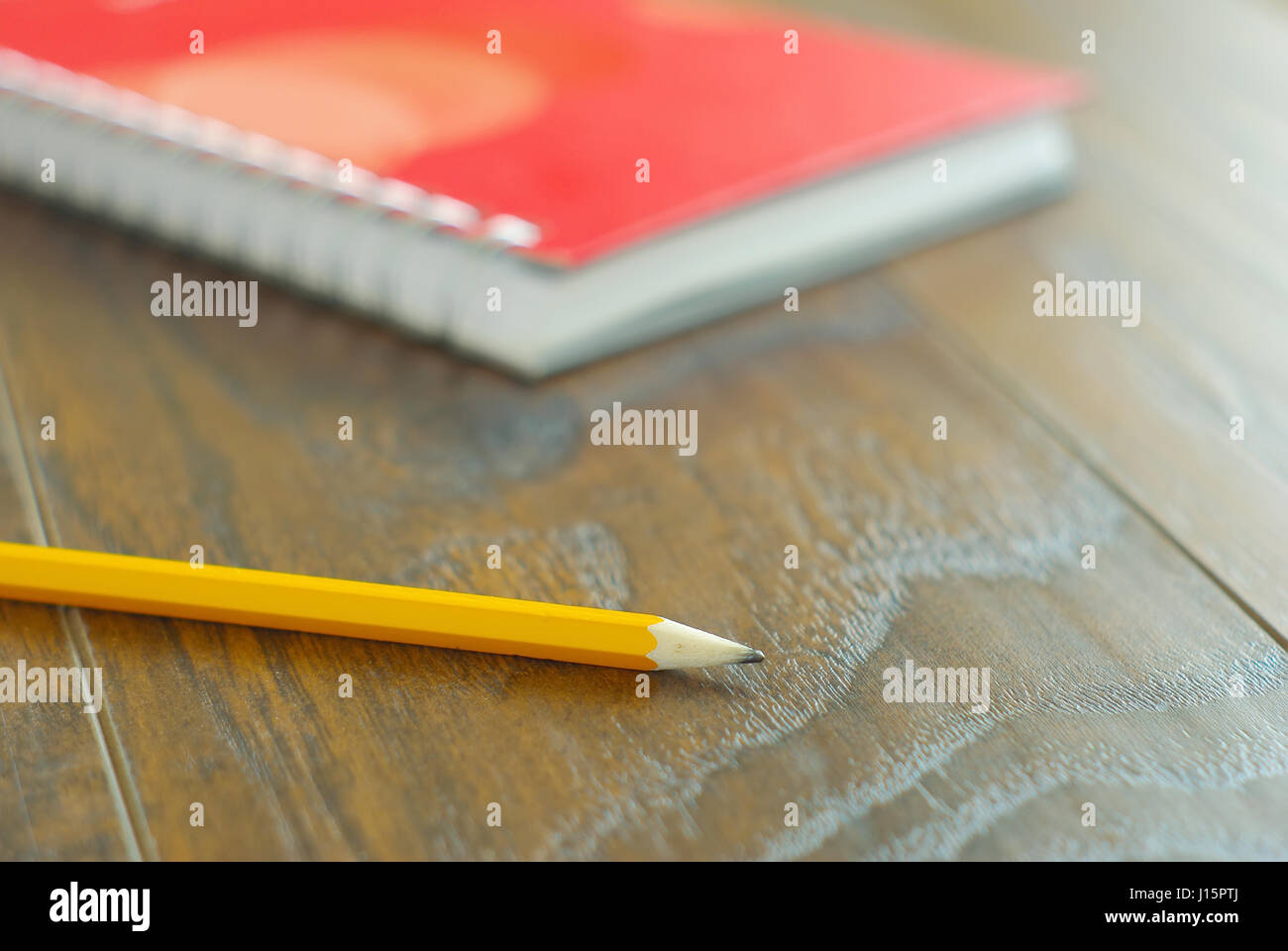 Pencil on table with notebook background. Diary organizer office ...