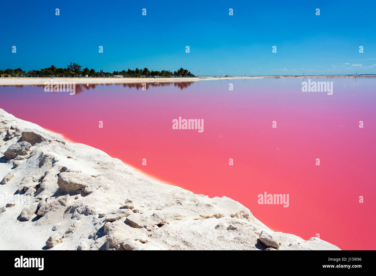 Landscape of stunning red water for salt production near Rio Lagartos ...