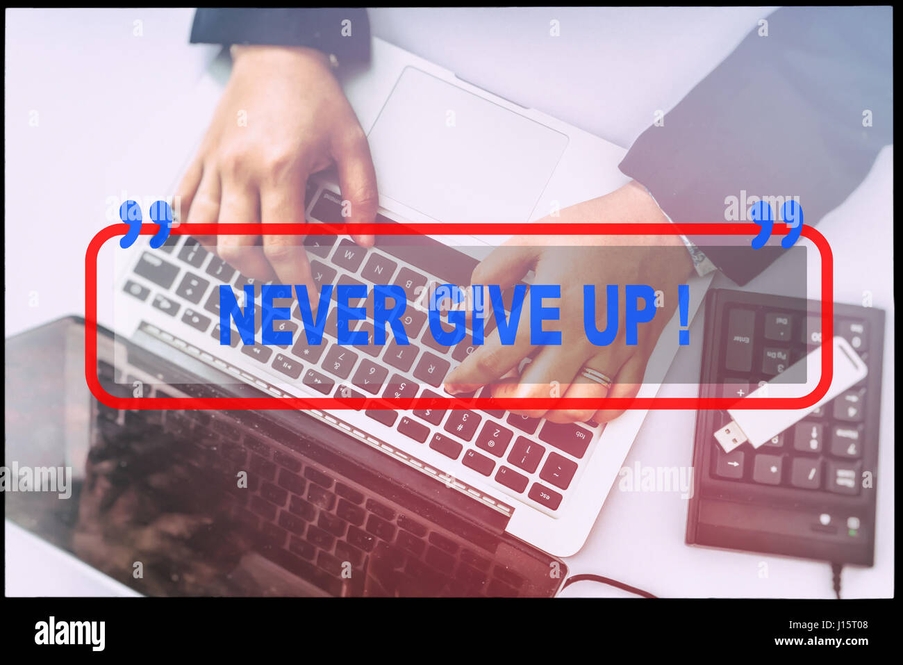 Hand and text "NEVER GIVE UP" with vintage background. Technology ...