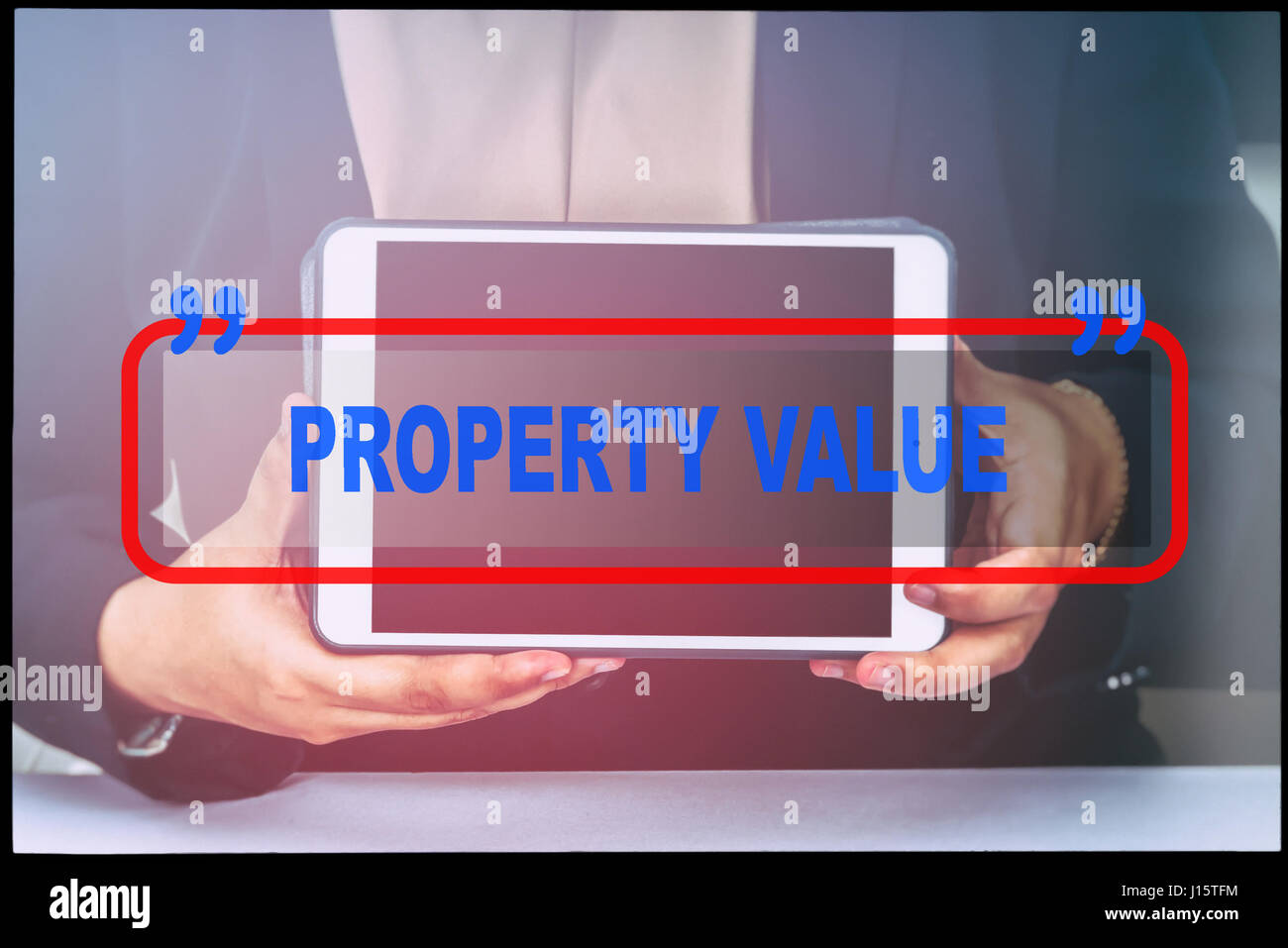 Hand and text "PROPERTY VALUE" with vintage background. Technology ...