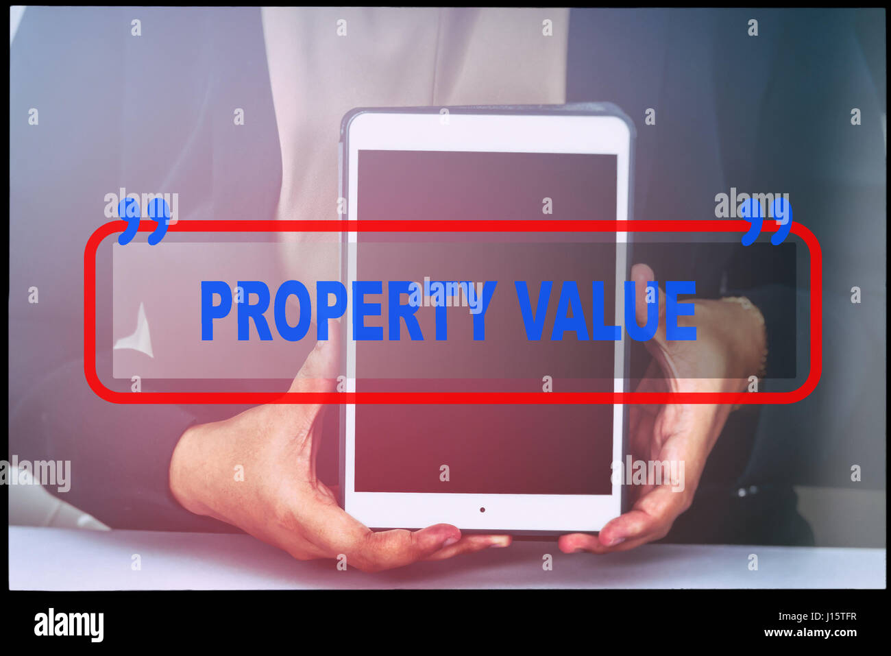 Hand and text "PROPERTY VALUE" with vintage background. Technology ...
