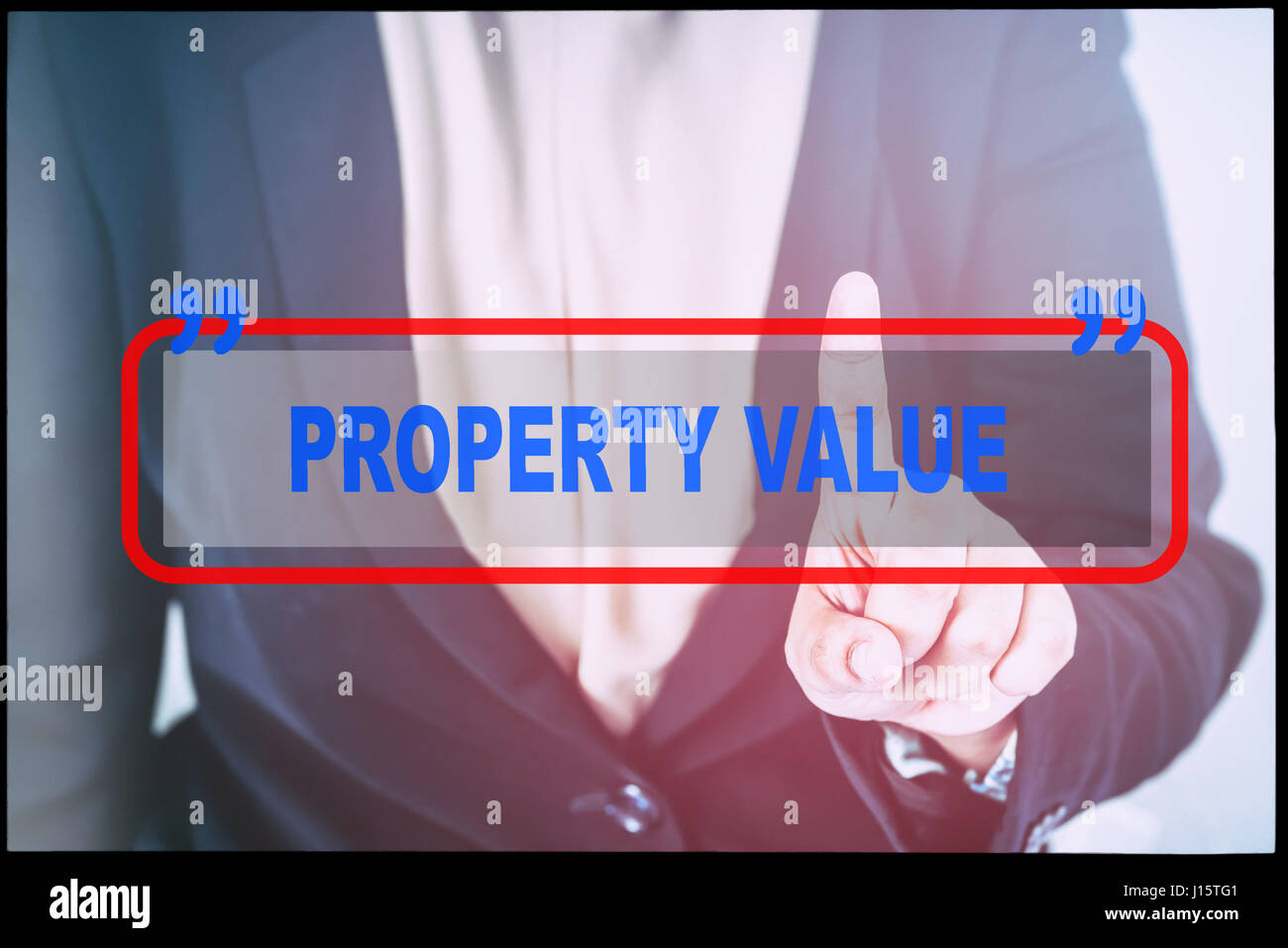 Hand and text "PROPERTY VALUE" with vintage background. Technology ...