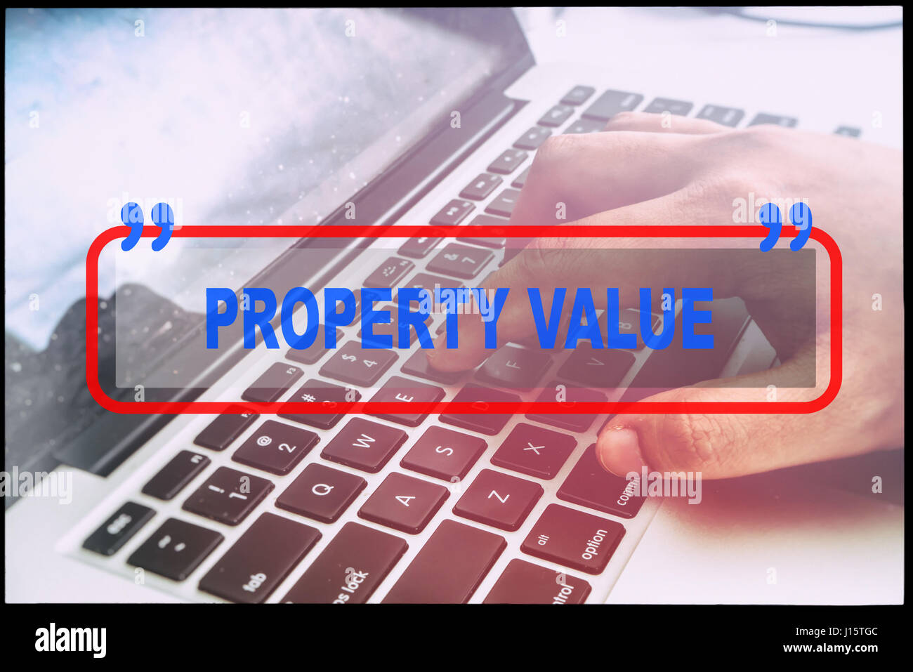 Hand and text "PROPERTY VALUE" with vintage background. Technology ...