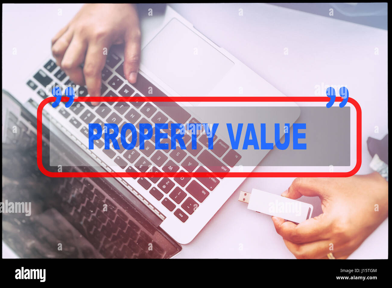 Hand and text "PROPERTY VALUE" with vintage background. Technology ...