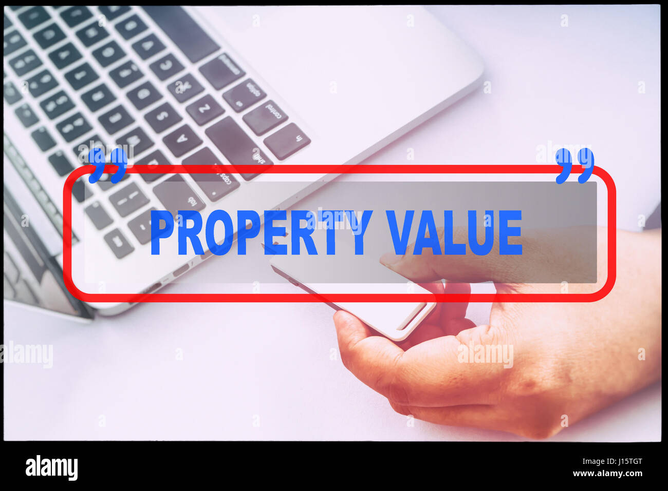 Hand and text "PROPERTY VALUE" with vintage background. Technology ...