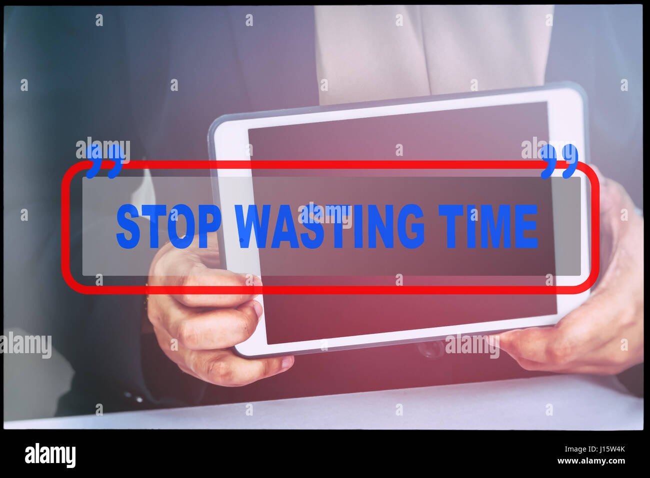 Hand and text "STOP WASTING TIME" with vintage background. Technology ...