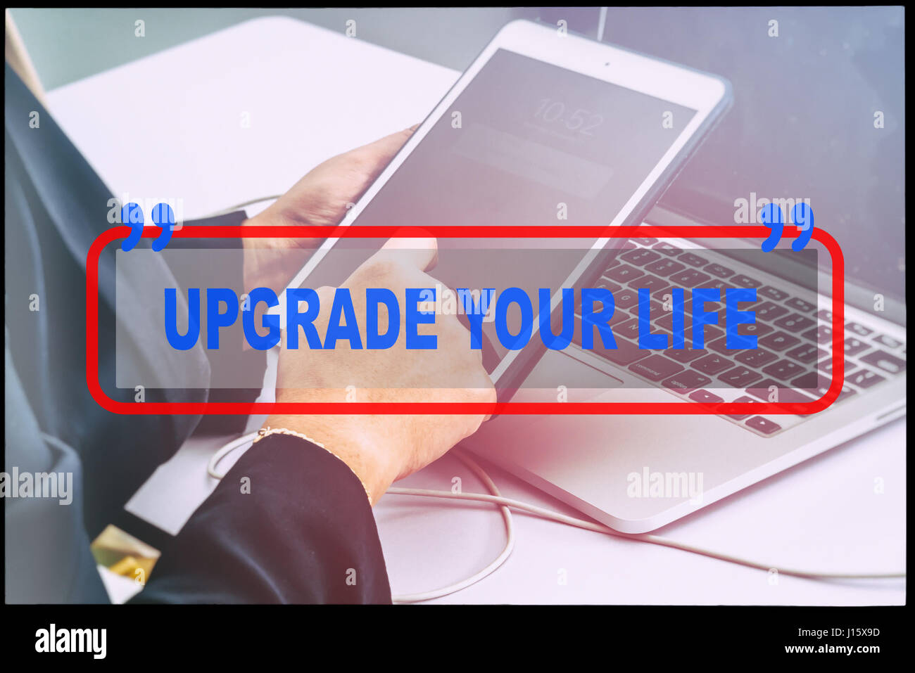 Hand and text "UPGRADE YOUR LIFE" with vintage background. Technology ...