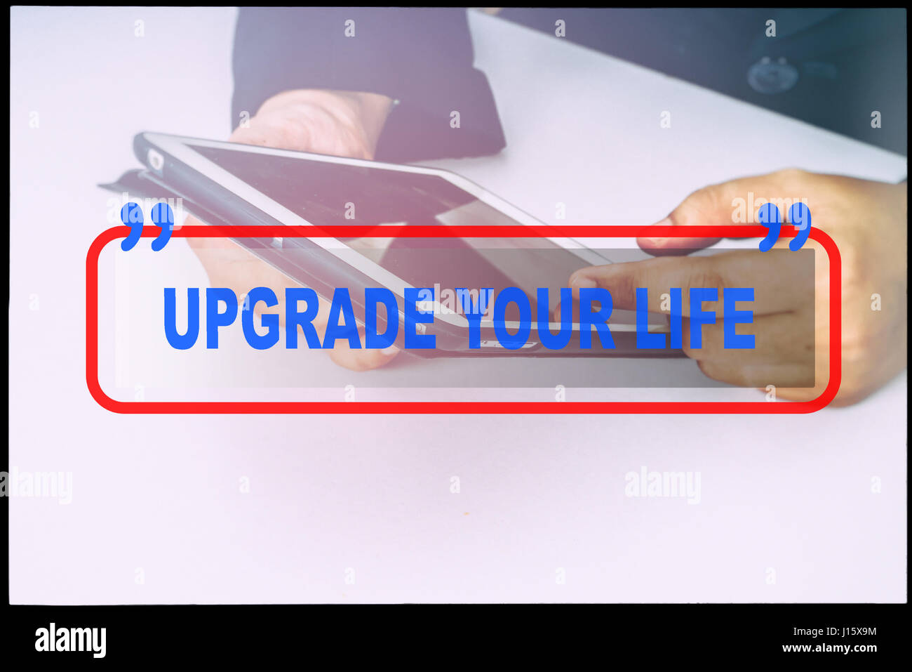 Hand and text "UPGRADE YOUR LIFE" with vintage background. Technology ...