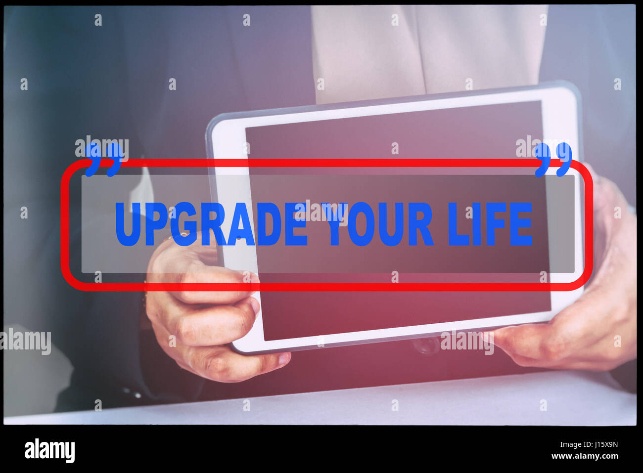 Hand and text "UPGRADE YOUR LIFE" with vintage background. Technology ...