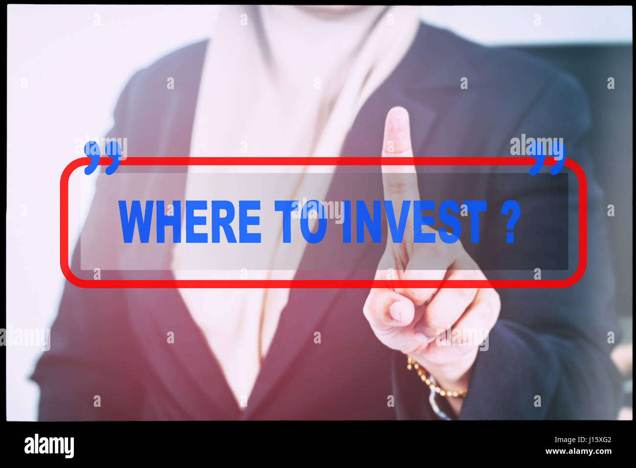 Hand and text "WHERE TO INVEST" with vintage background. Technology ...