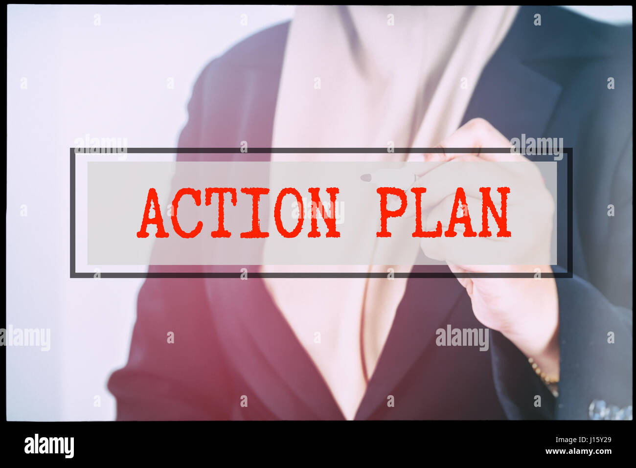 Hand and text ACTION PLAN with vintage backgound. Technology concept ...