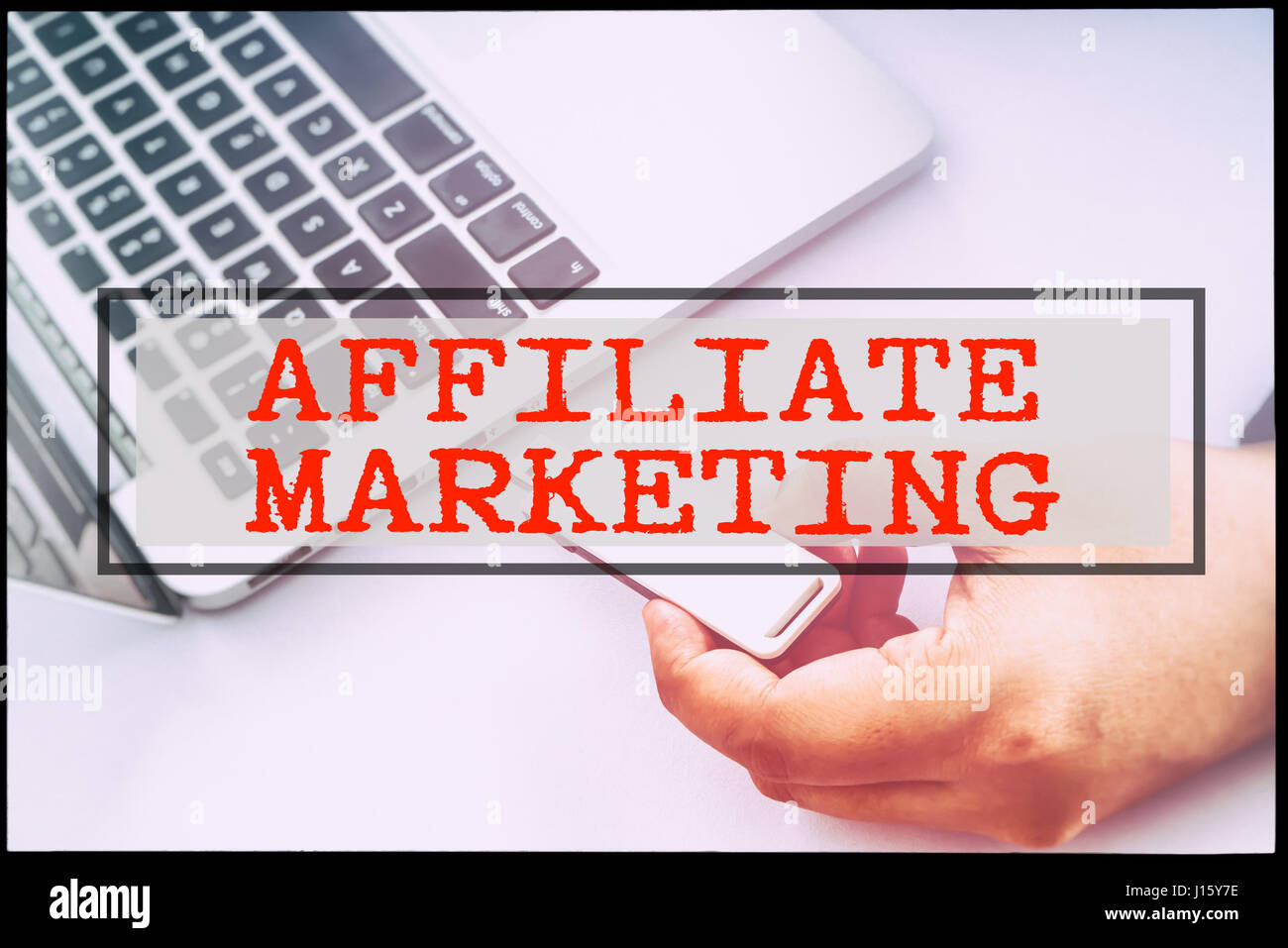 Hand and text AFFILIATE MARKETING with vintage background. Technology ...