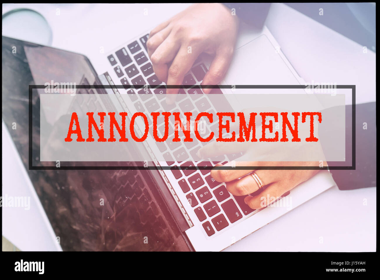 Hand and text ANNOUNCEMENT with vintage background. Technology concept ...