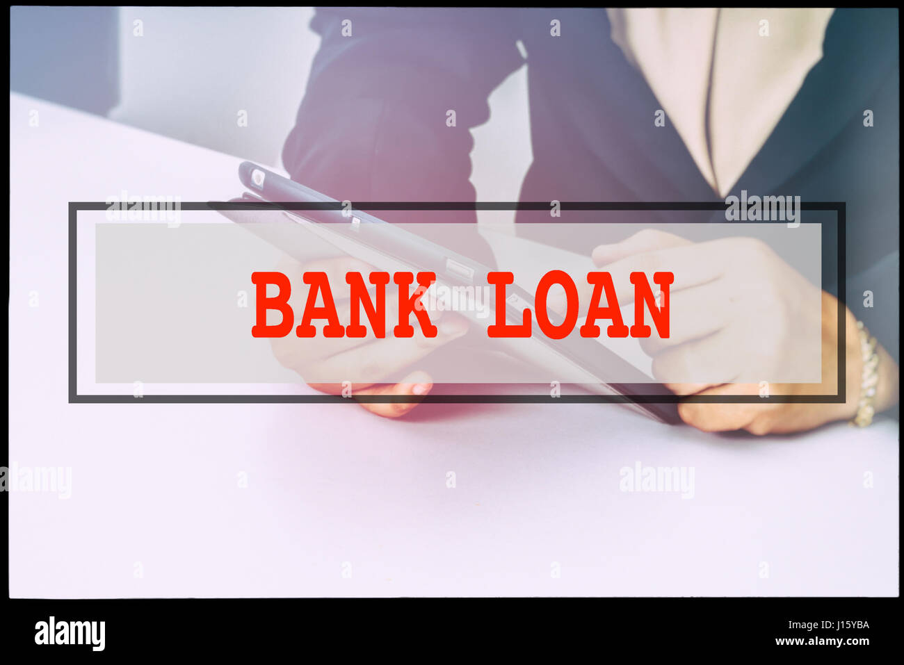Hand and text BANK LOAN with vintage background. Technology concept ...