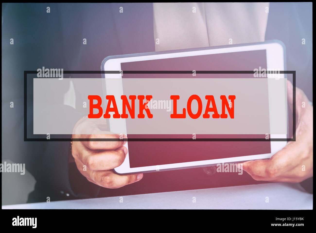 Hand and text BANK LOAN with vintage background. Technology concept ...