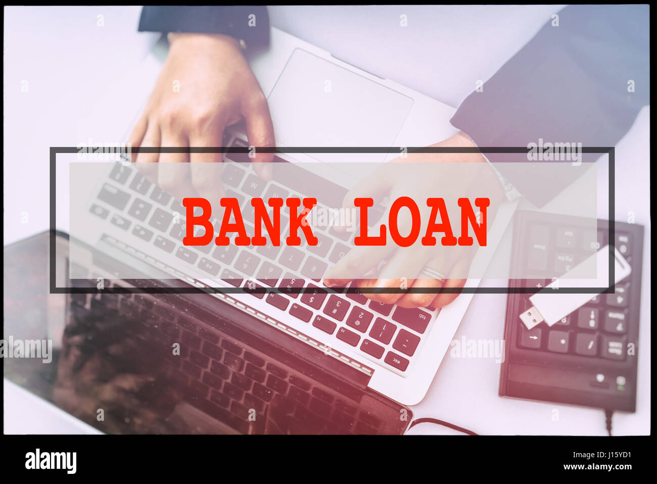 Hand and text BANK LOAN with vintage background. Technology concept ...