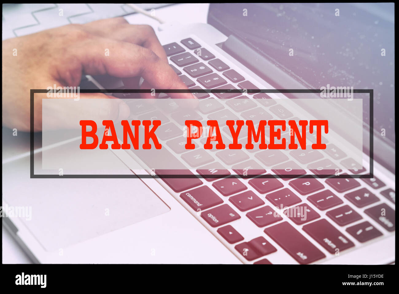 Hand and text BANK PAYMENT with vintage background. Technology concept ...