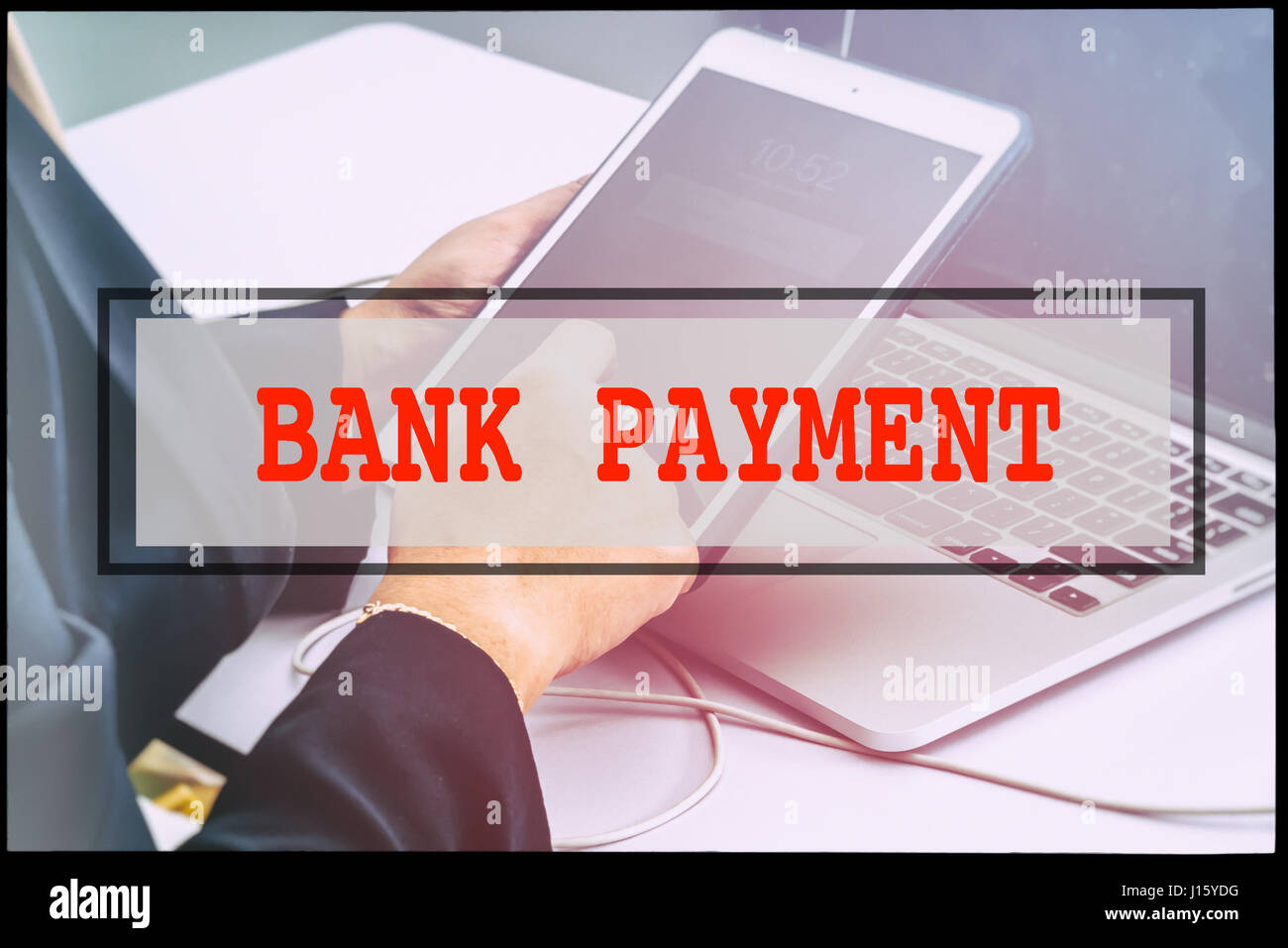 Hand and text BANK PAYMENT with vintage background. Technology concept ...