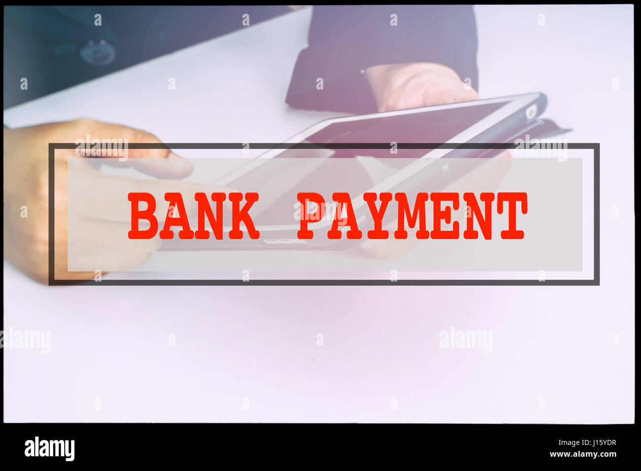 Hand and text BANK PAYMENT with vintage background. Technology concept ...