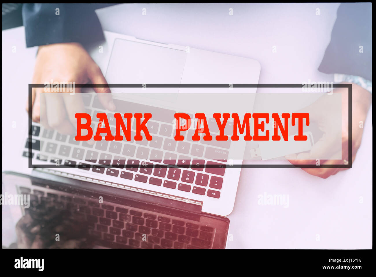 Hand and text BANK PAYMENT with vintage background. Technology concept ...