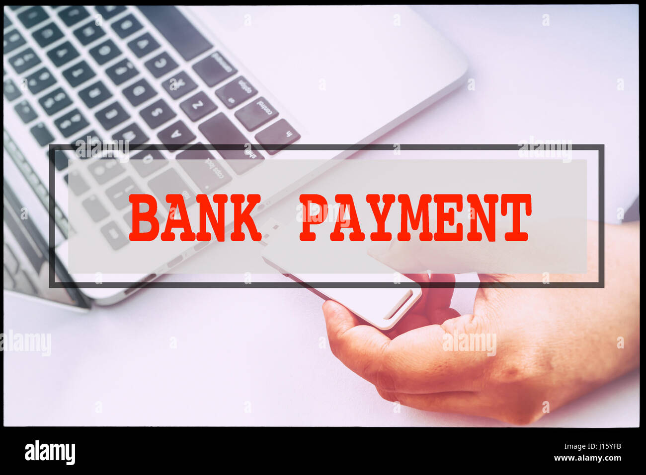 Hand and text BANK PAYMENT with vintage background. Technology concept ...