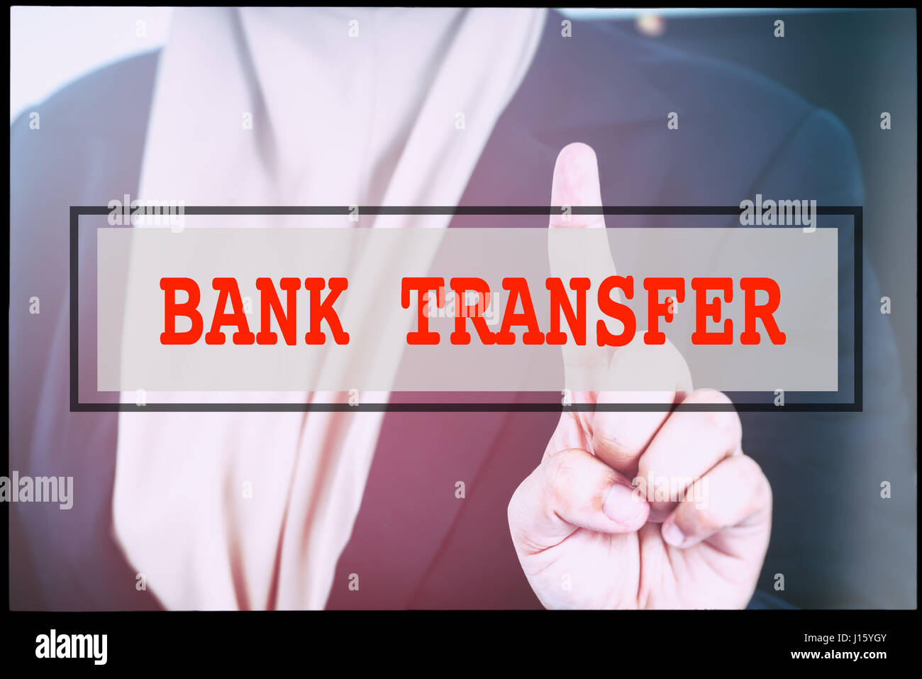 Hand and text BANK TRANSFER with vintage background. Technology concept ...