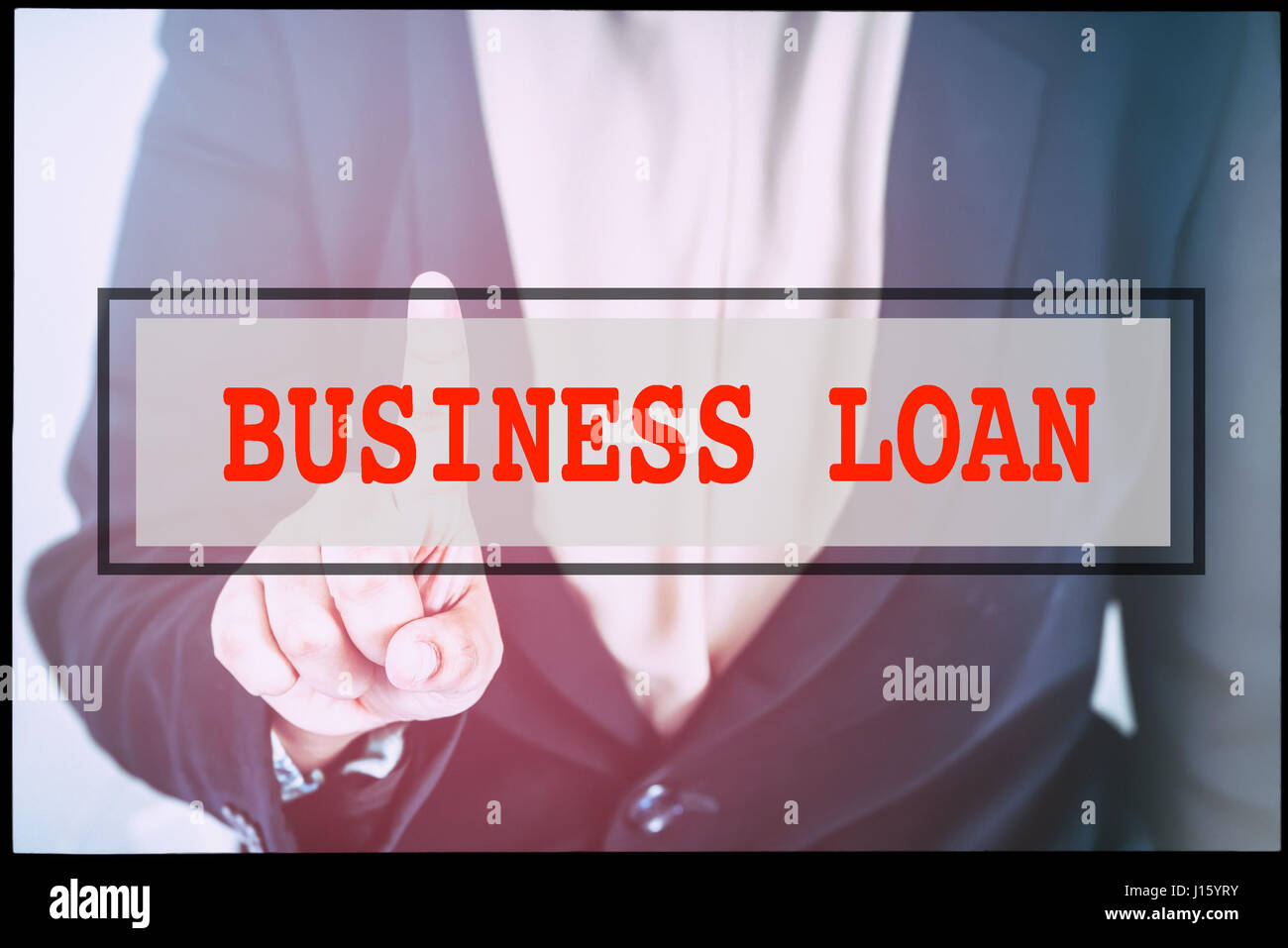 Hand and text BUSINESS LOAN with vintage background. Technology concept ...