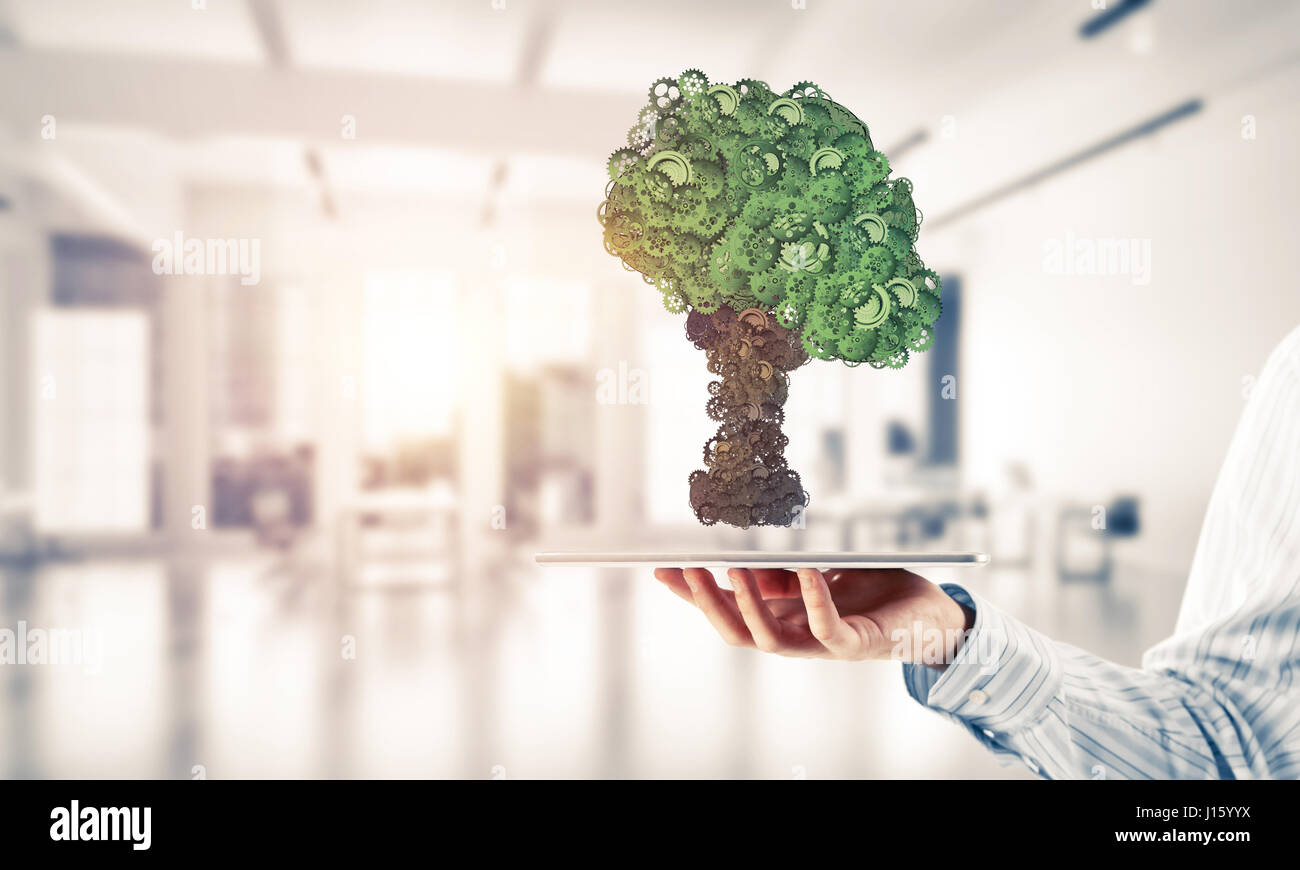 Eco green environment concept presented by tree as working mecha Stock ...