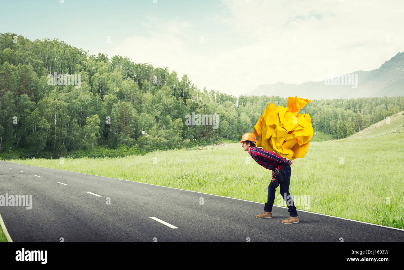 Engineer man carry load Stock Photo - Alamy