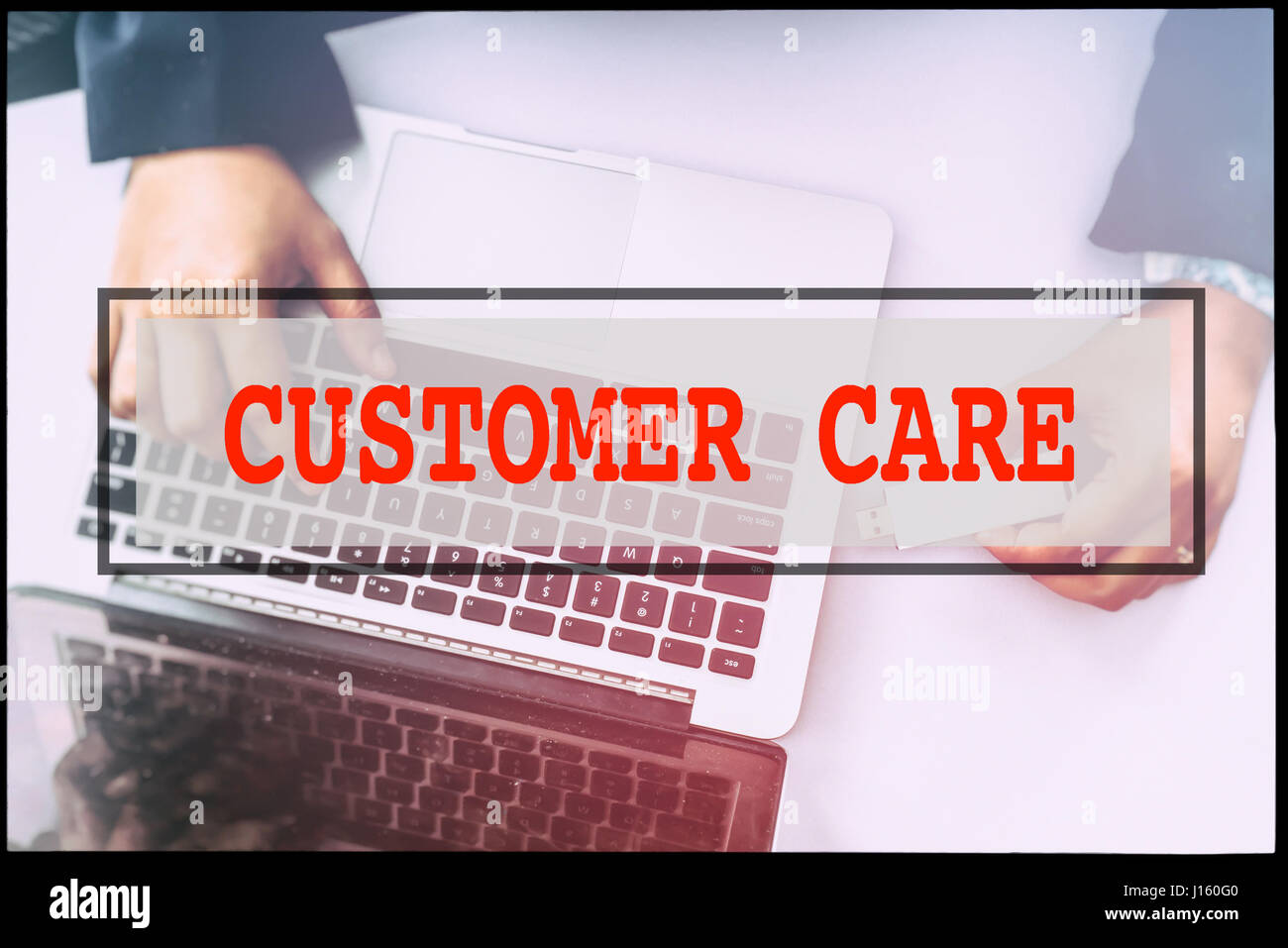 Hand and text CUSTOMER CARE with vintage background. Technology concept ...