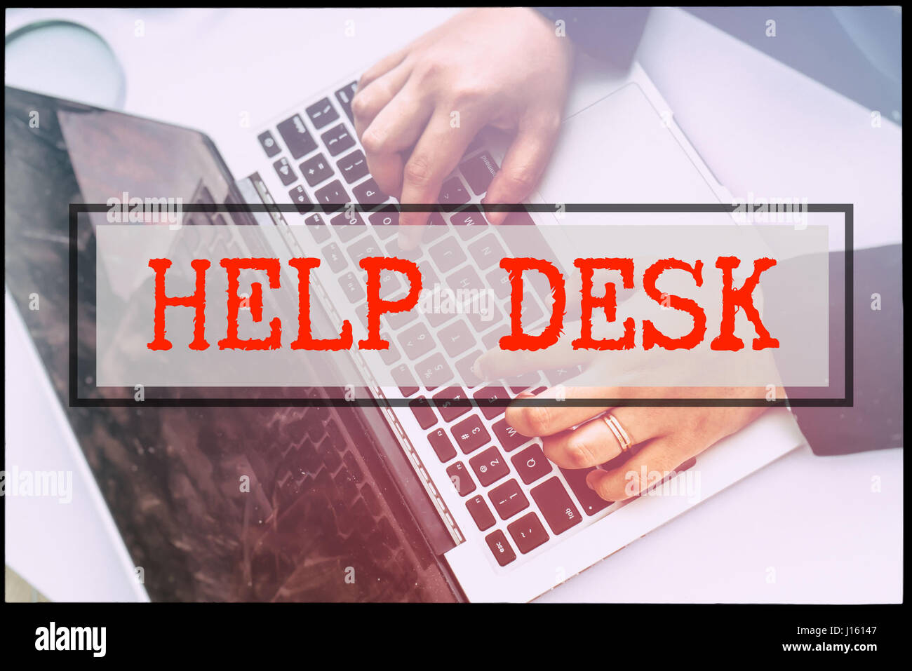 Hand and text HELP DESK with vintage background. Technology concept Stock Photo - Alamy