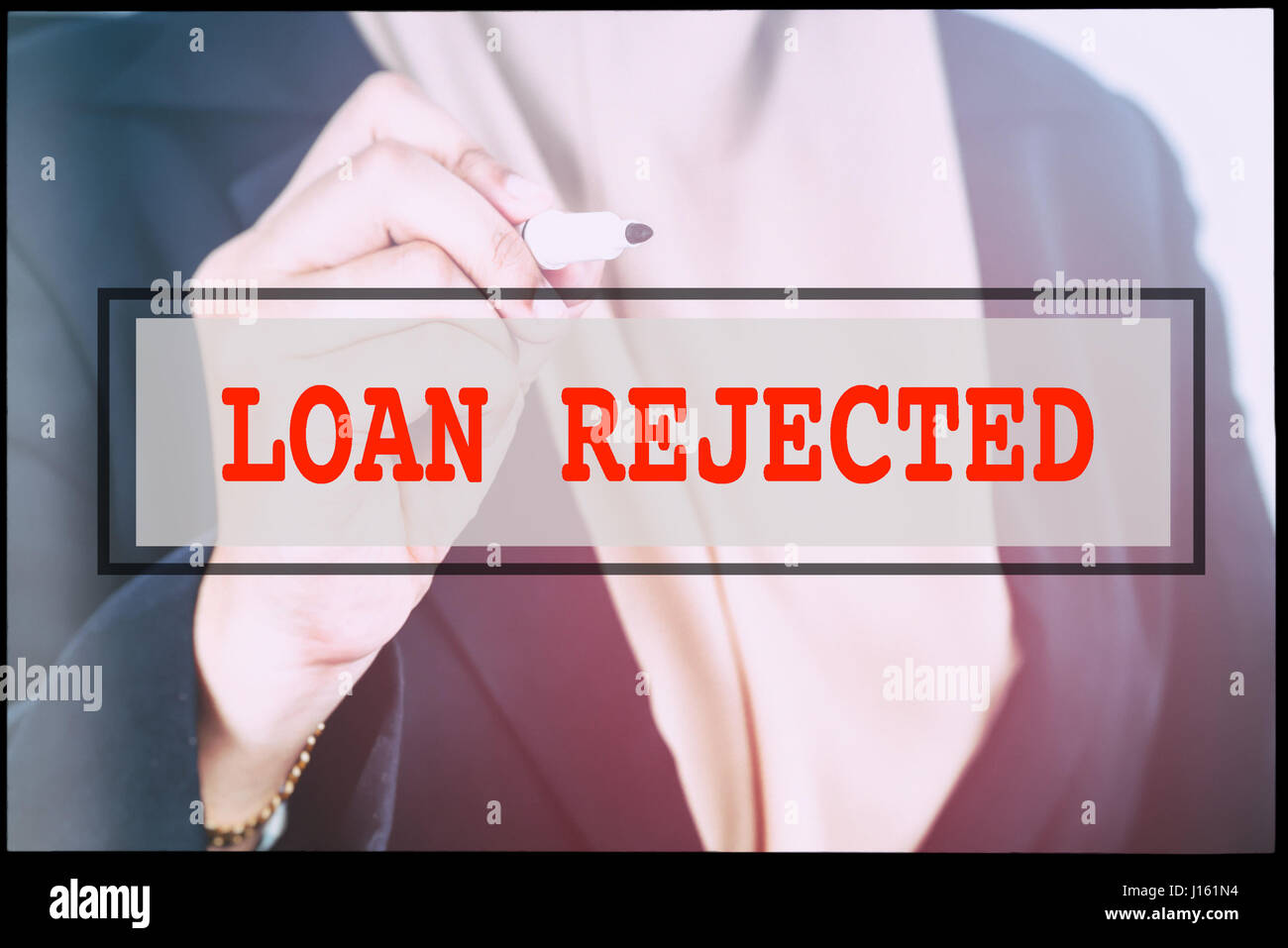 Hand and text LOAN REJECTED with vintage background. Technology concept ...