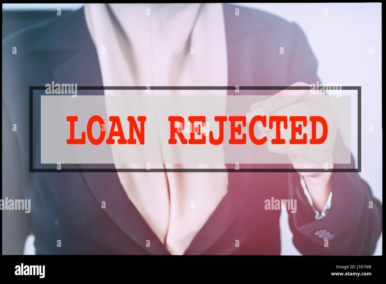 Hand and text LOAN REJECTED with vintage background. Technology concept ...