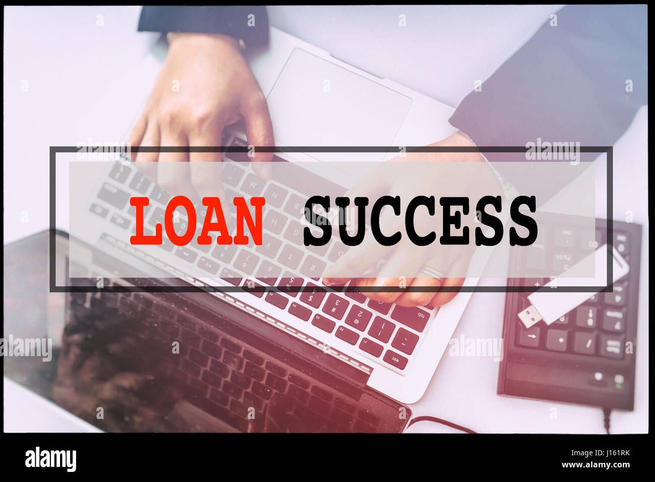 Hand and text LOAN SUCCESS with vintage background. Technology concept ...