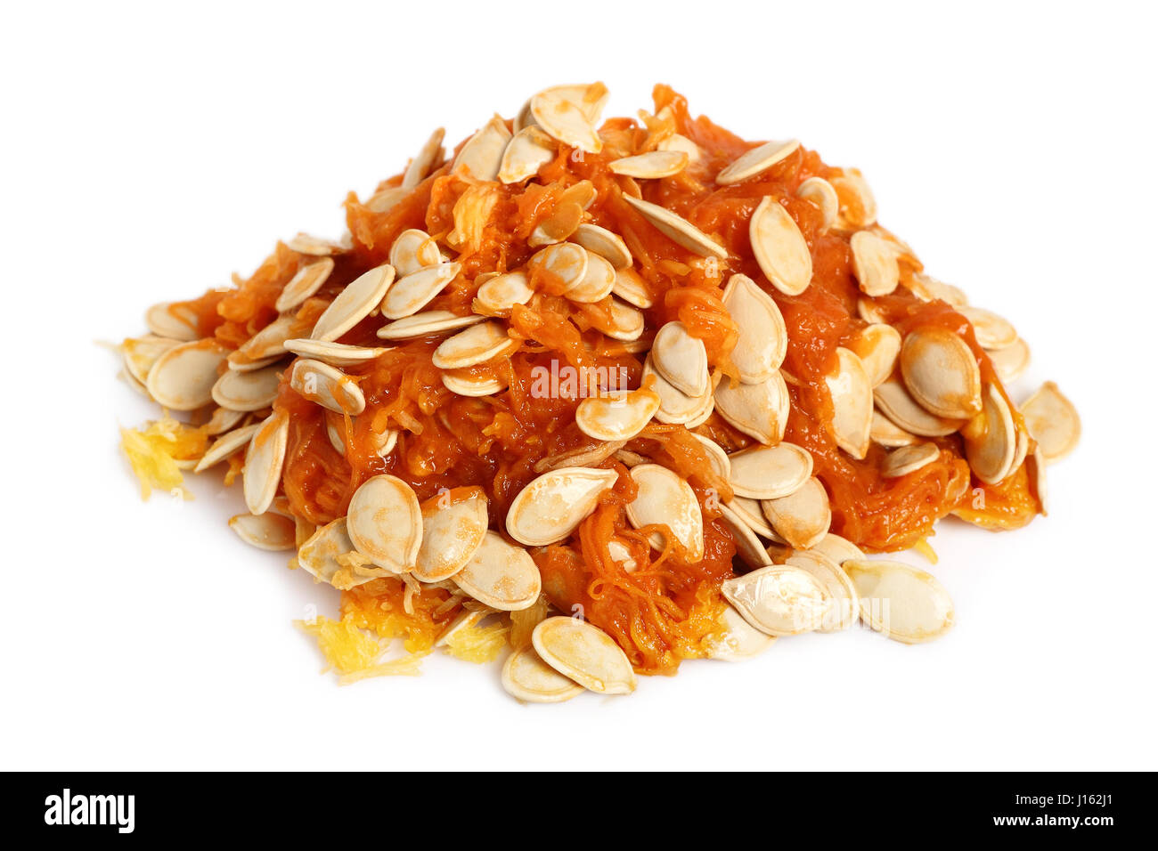 Seeds and pulp of pumpkin. Isolated on white background Stock Photo - Alamy