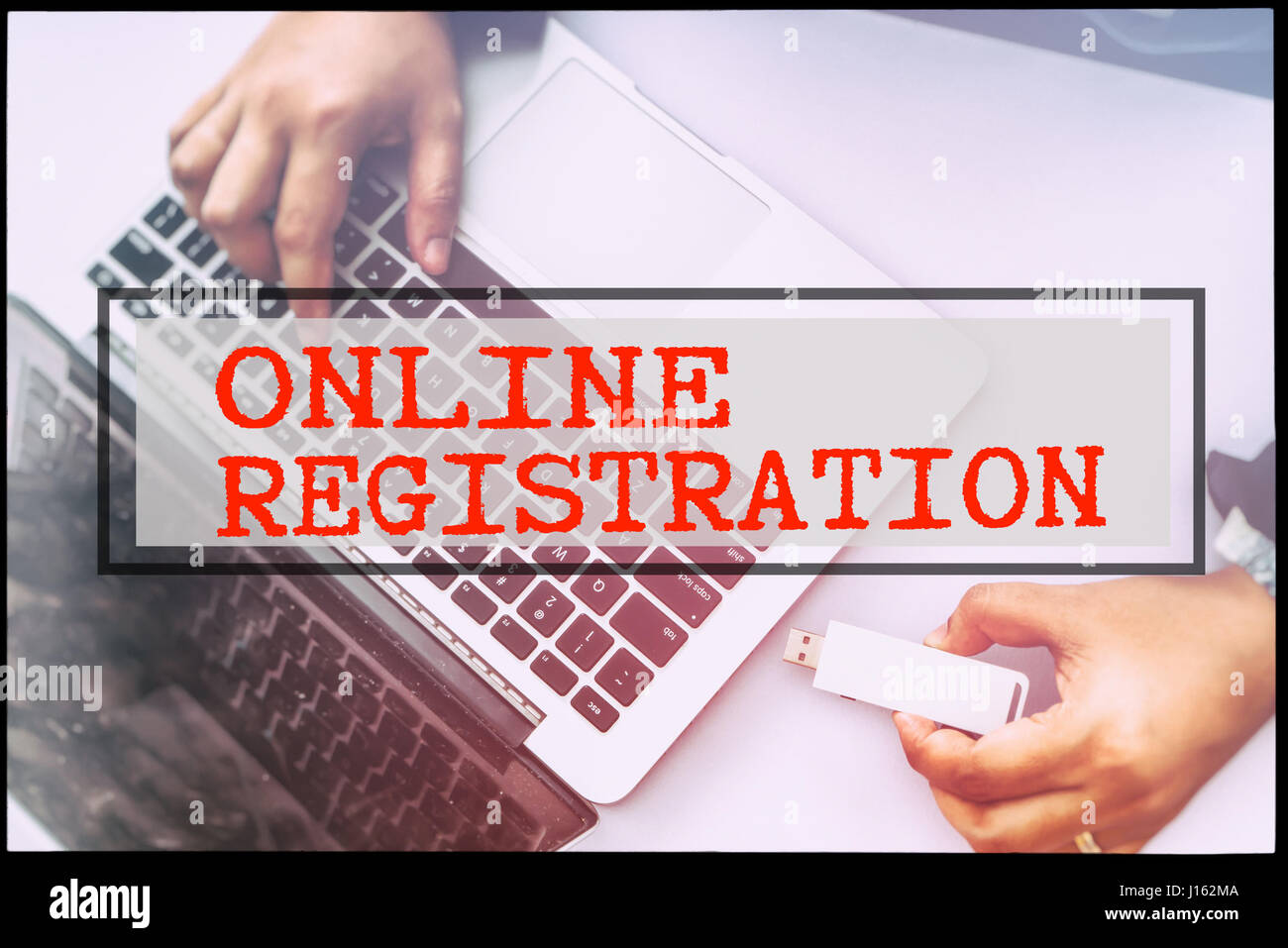 Hand and text ONLINE REGISTRATION with vintage background. Technology ...