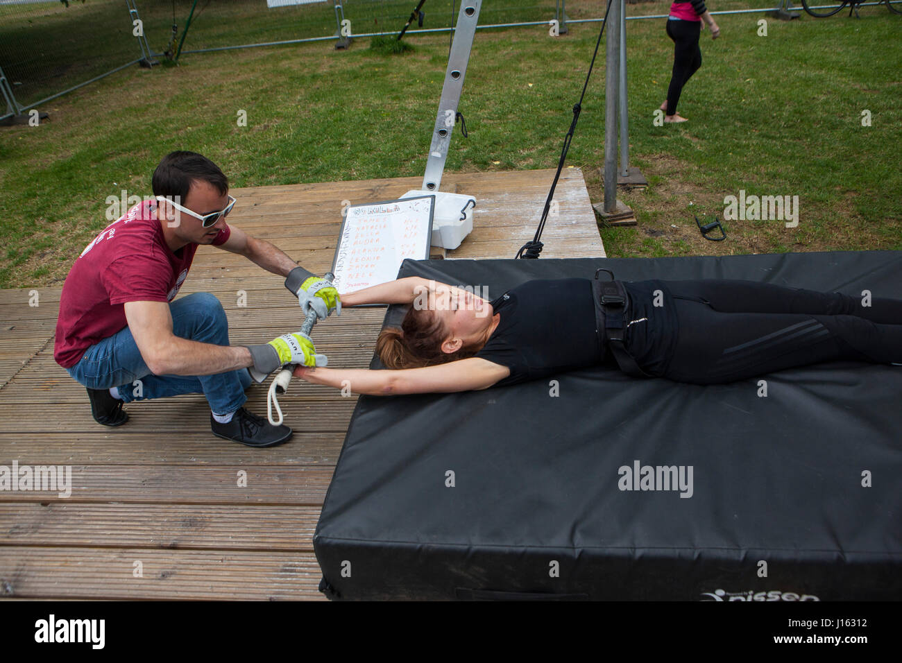 Ben Sobel, trapeze instructor, gives Isabella Mackie pointers for her ...