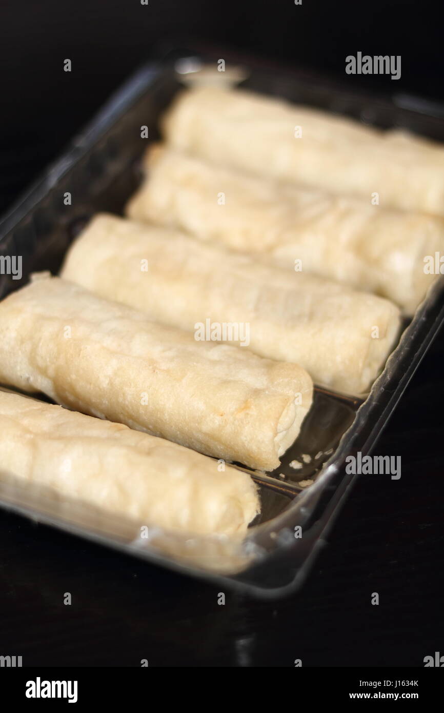 Spring roll in disposable plastic tray Stock Photo - Alamy